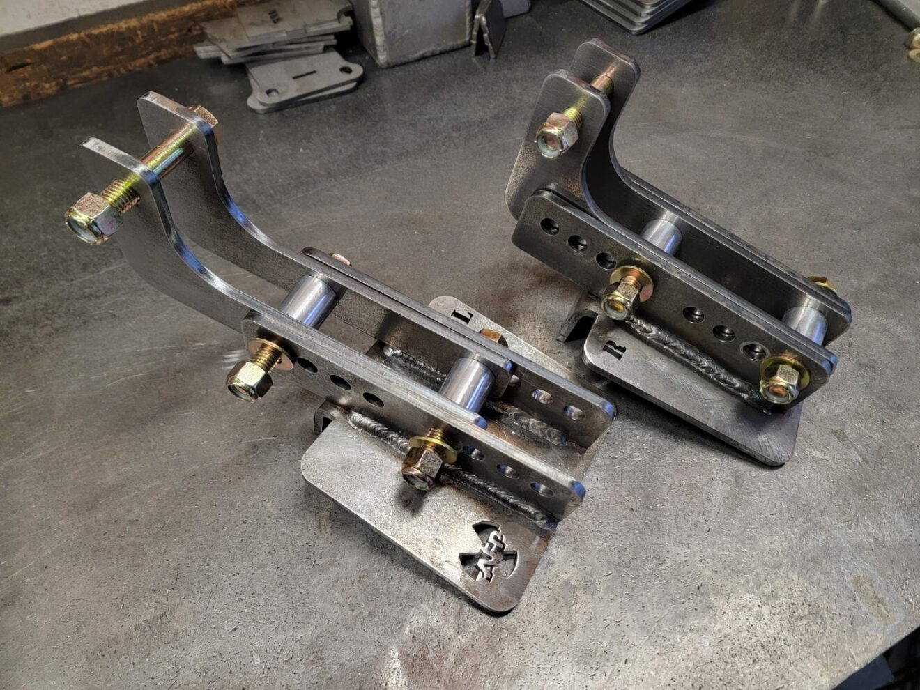 99-06 Weld-On Upper Shock Brackets - Atomic Fabrication